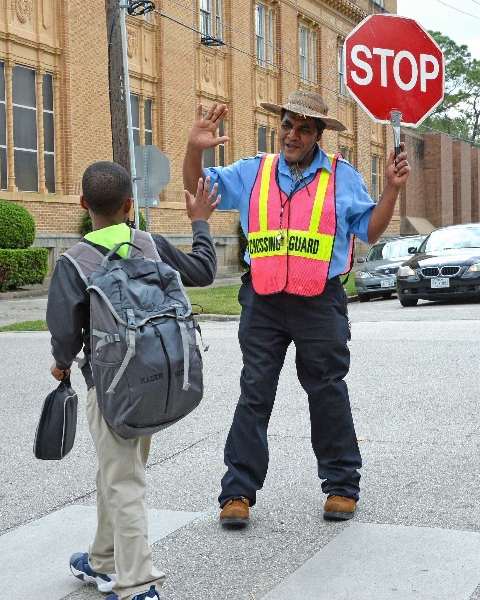 Helping hands give back to beloved crossing guard