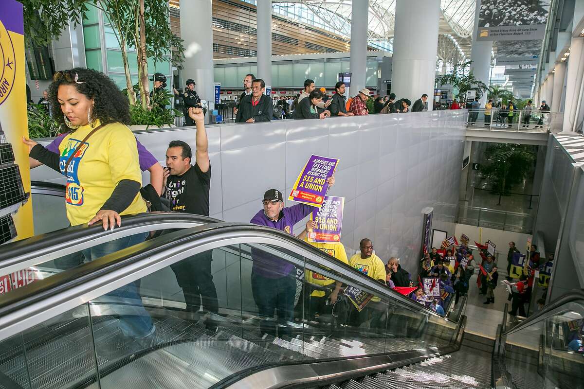 Workers hold SFO, Oakland strikes for national $15 wage