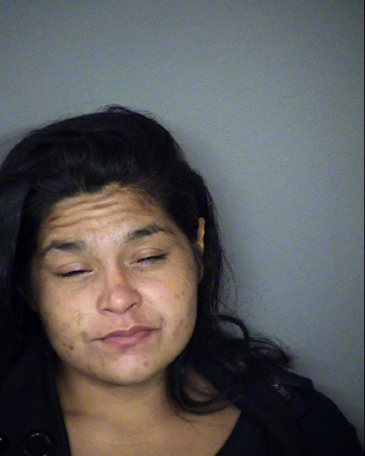 Police: 4 charged in East Side ax murder prompted by money dispute