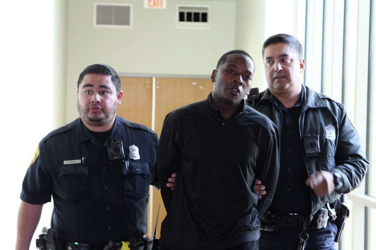 Video: Murder suspect spits at TV reporter while in custody in San Antonio