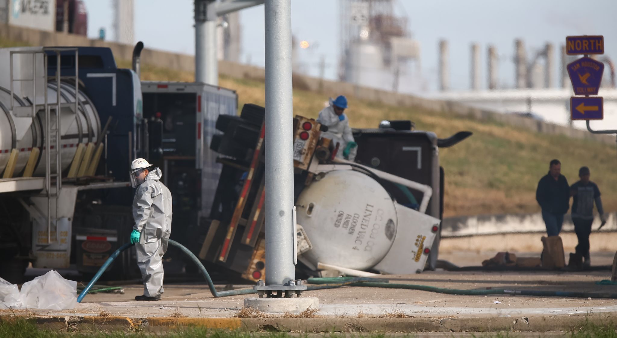 Tanker truck rolls over on Highway 225, spills hydrochloric acid