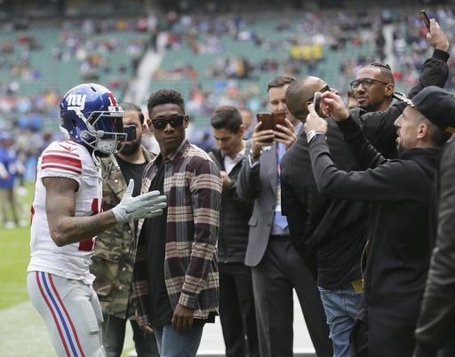The Latest: NFL celebrates arrival in London rugby home