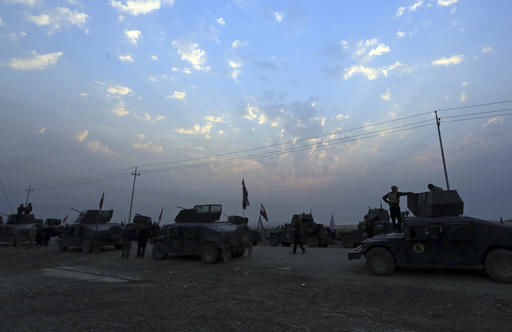 Iraq forces shell IS near Mosul; group urges airstrike probe