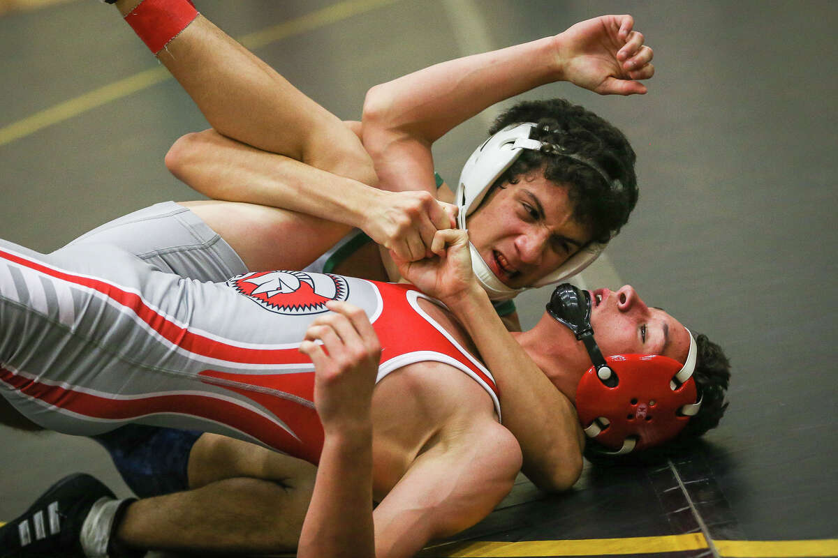 WRESTLING: Local athletes compete at The Woodlands Invitational