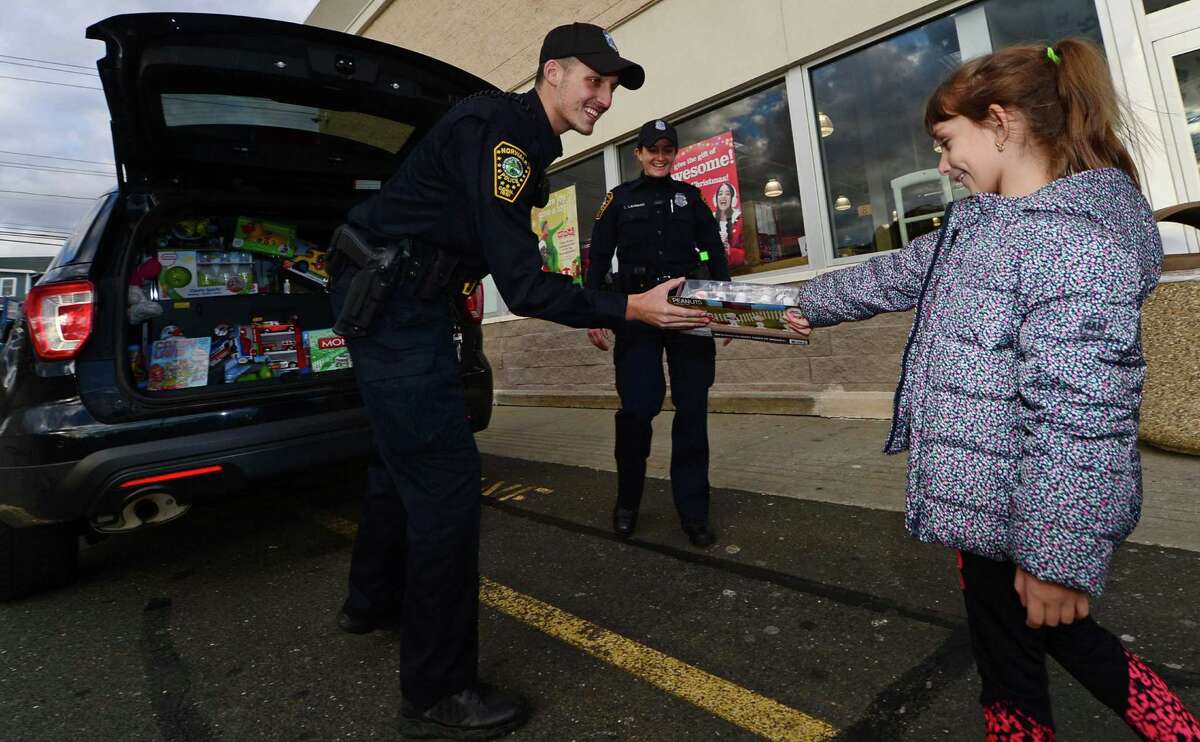 Norwalk police hold Stuff-A-Cruiser event