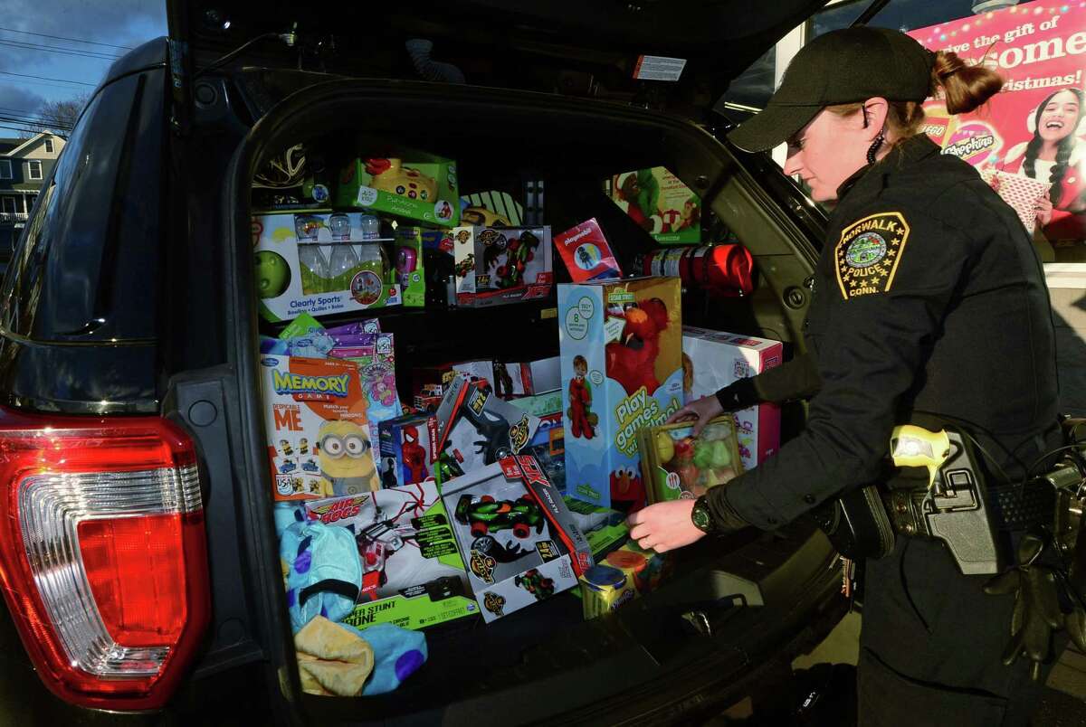 Norwalk police hold Stuff-A-Cruiser event