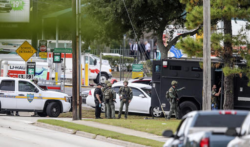 The Latest: SWAT team rescues Florida bank robbery hostages