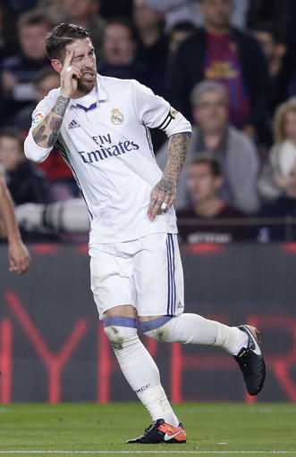 Ramos strikes in 90th as Madrid draws 1-1 at Barcelona