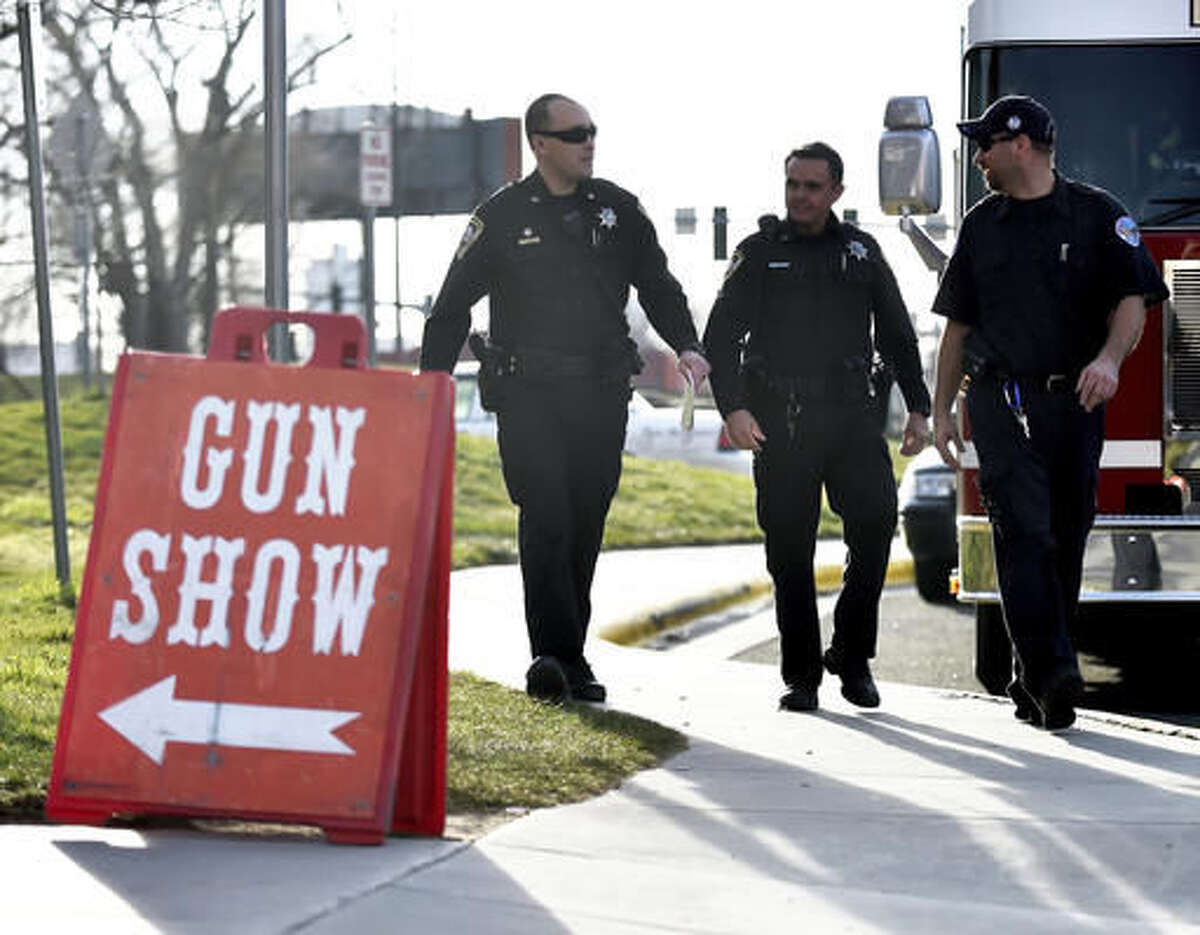 Rifle discharges at Montana gun show, injuring 2