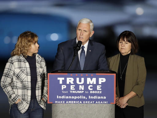 The Latest: Pence arrives home to Indiana