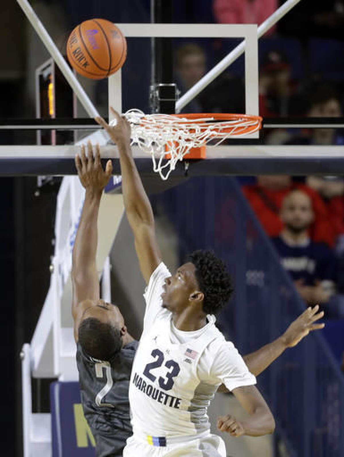 Johnson's 21 points lead Marquette past Vanderbilt 95-71