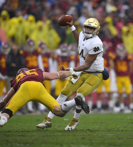 Referee Ron Cherry hurt during Notre Dame-USC game