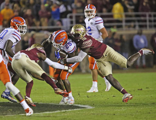Cook breaks record in Florida State's 31-13 win over Gators