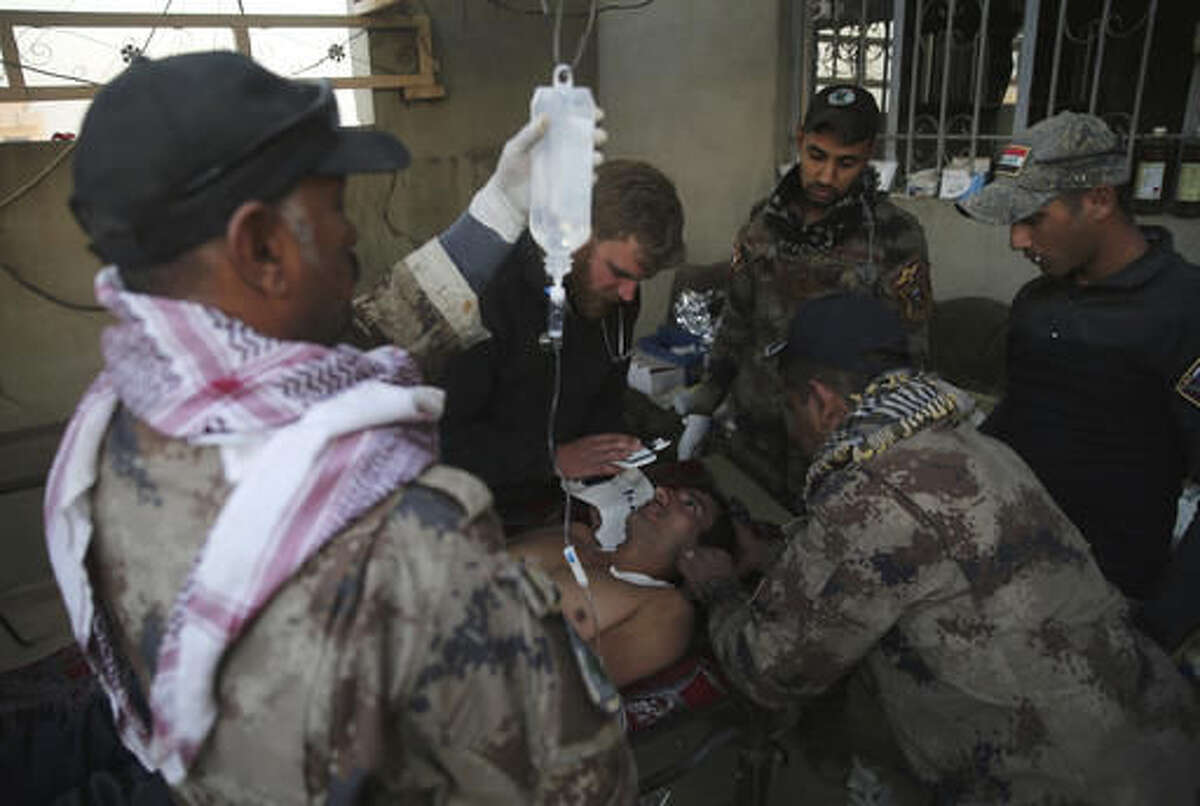 Iraq hospital brimming with Mosul civilian, army casualties
