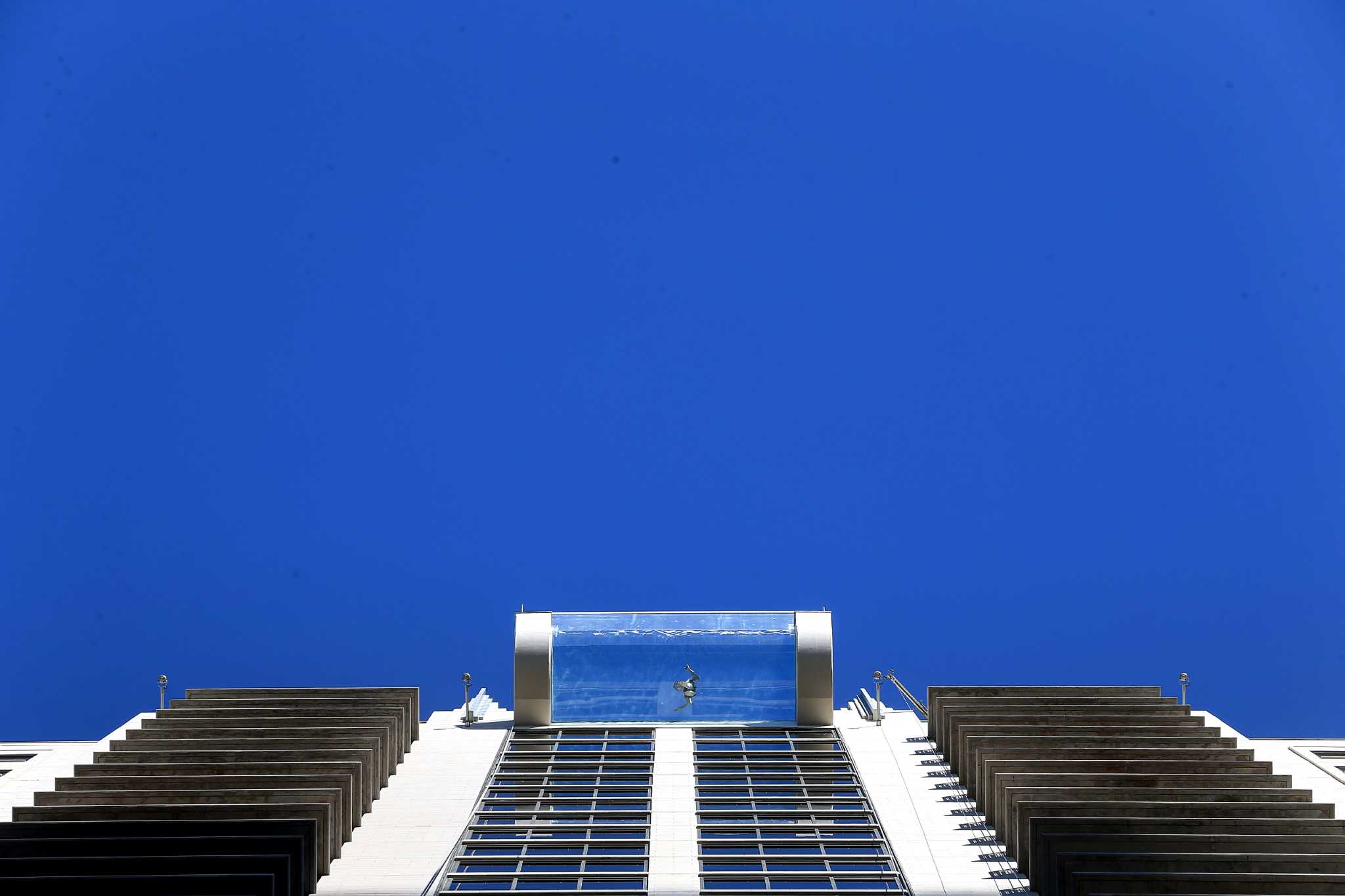 Through the pool bottom, a view of downtown