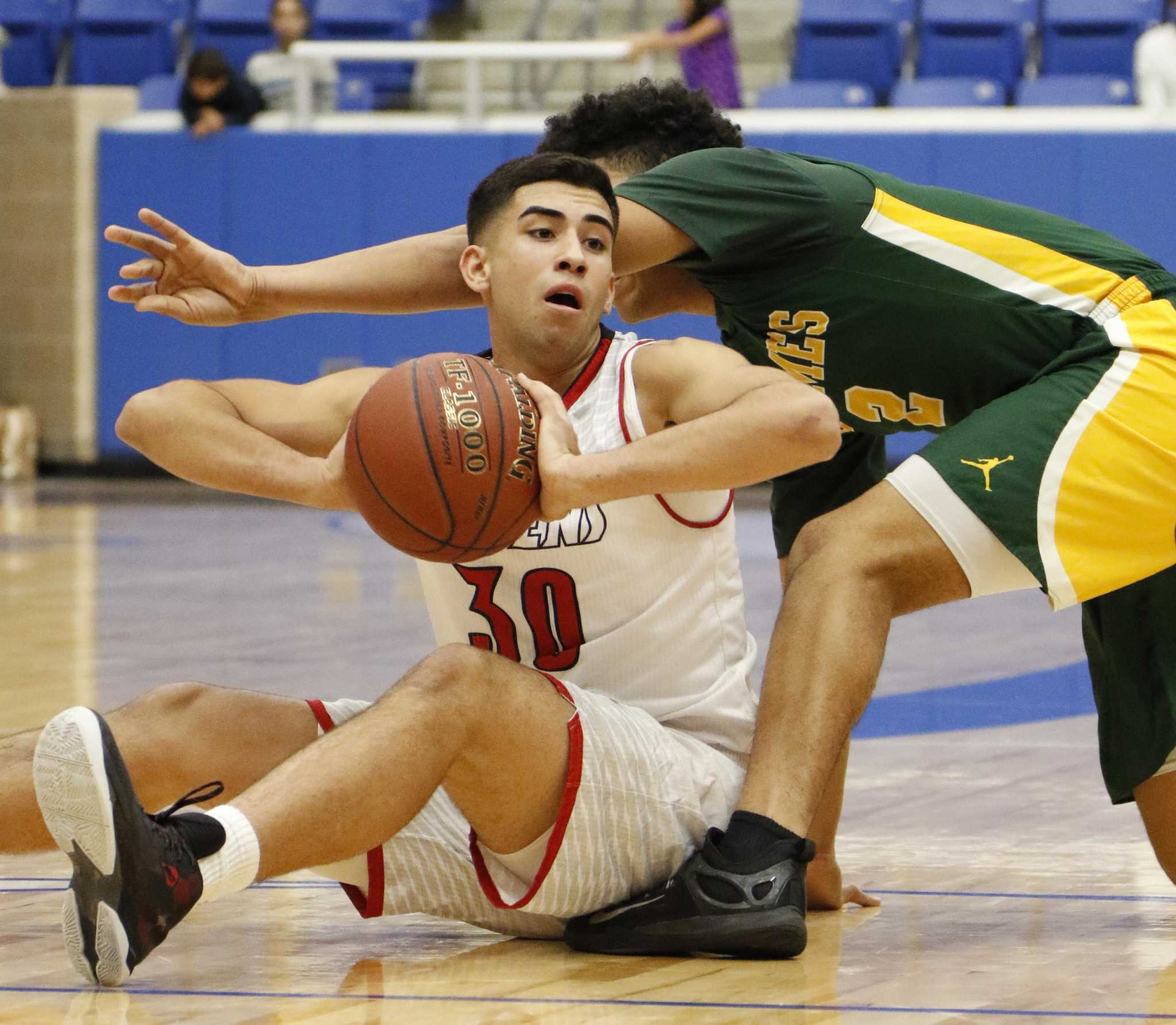 Coleman takes over OT as Stevens holds off Holmes