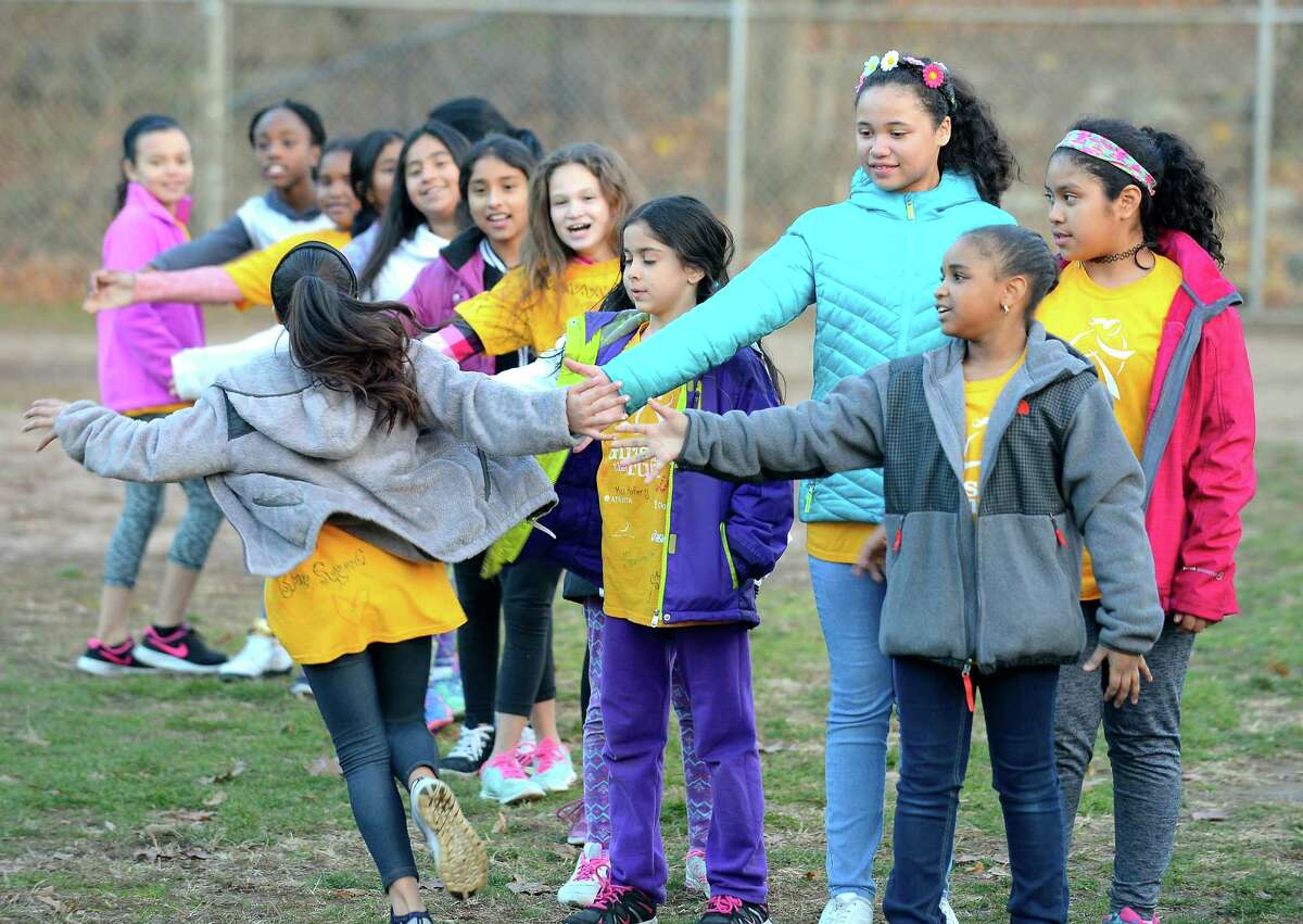 Girls on the Run coaches Toquam girls to be their best