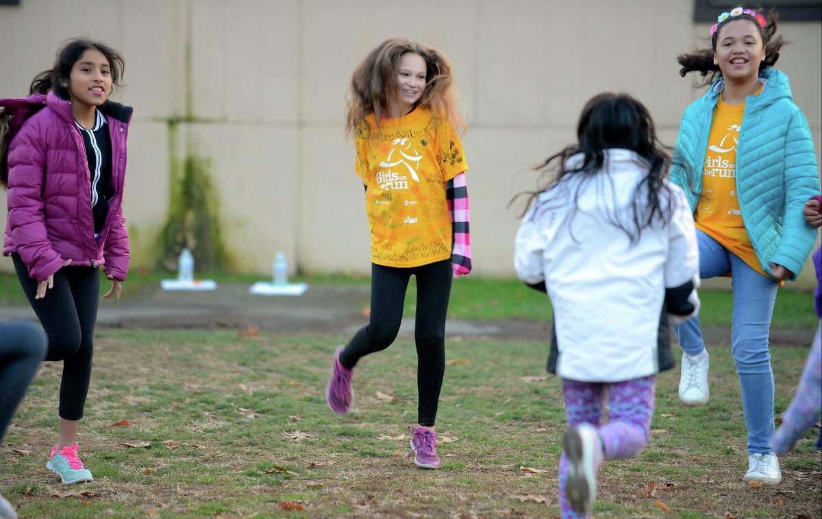 Girls on the Run coaches Toquam girls to be their best