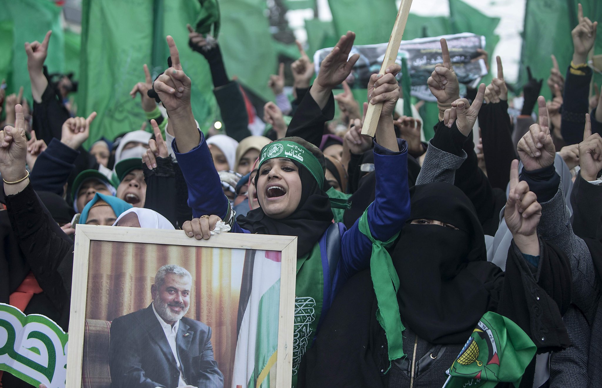 Thousands rally in Gaza for anniversary of Hamas founding