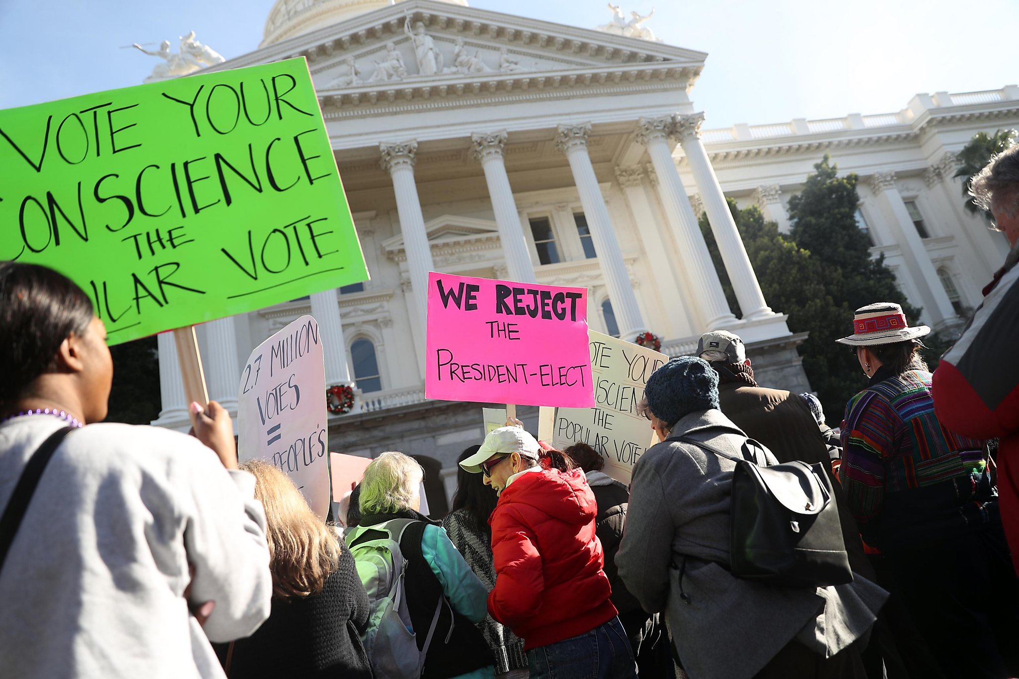 Trump easily takes Electoral College despite protests nationwide