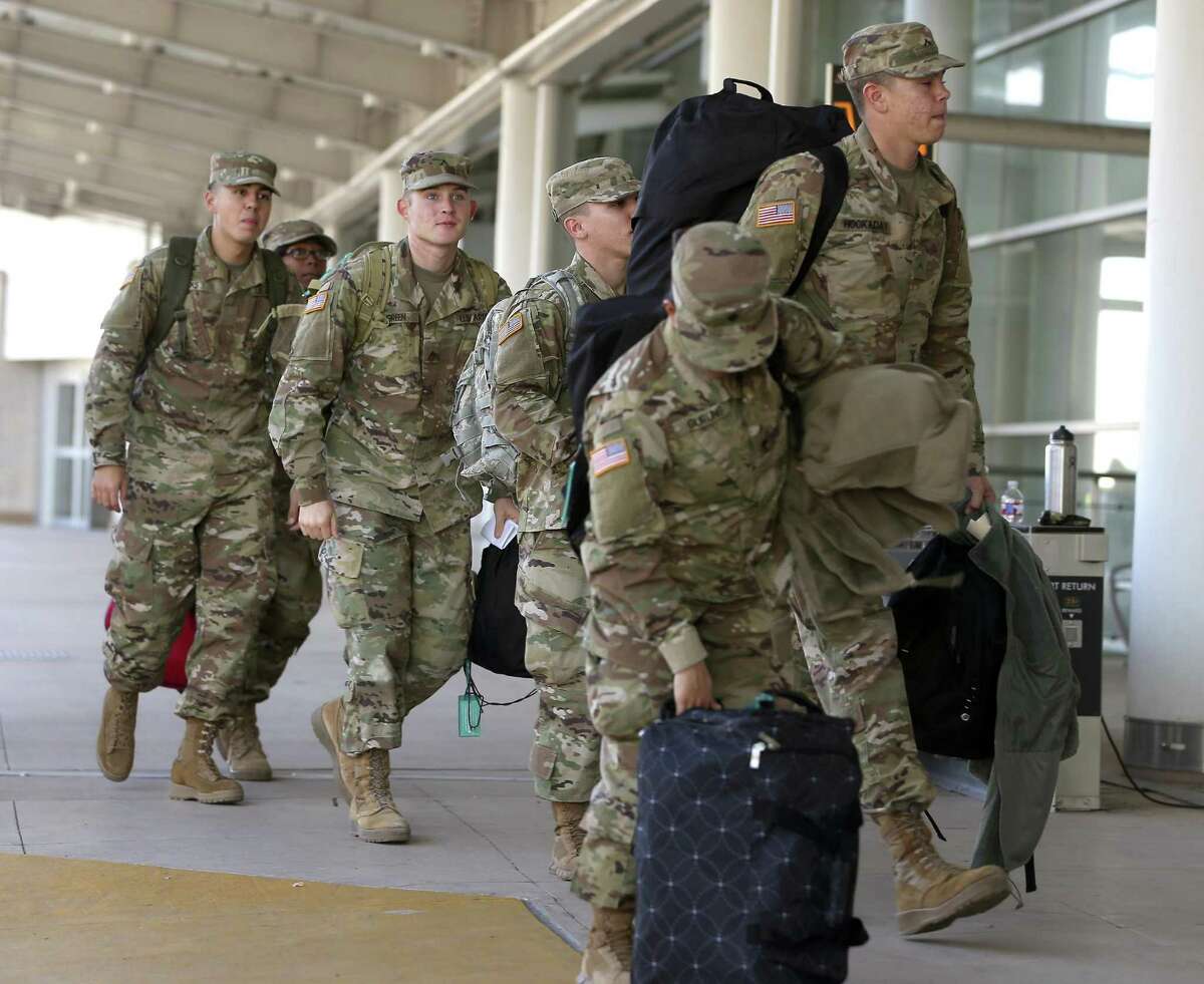 As Christmas nears, the airport here fills with men and women in uniform