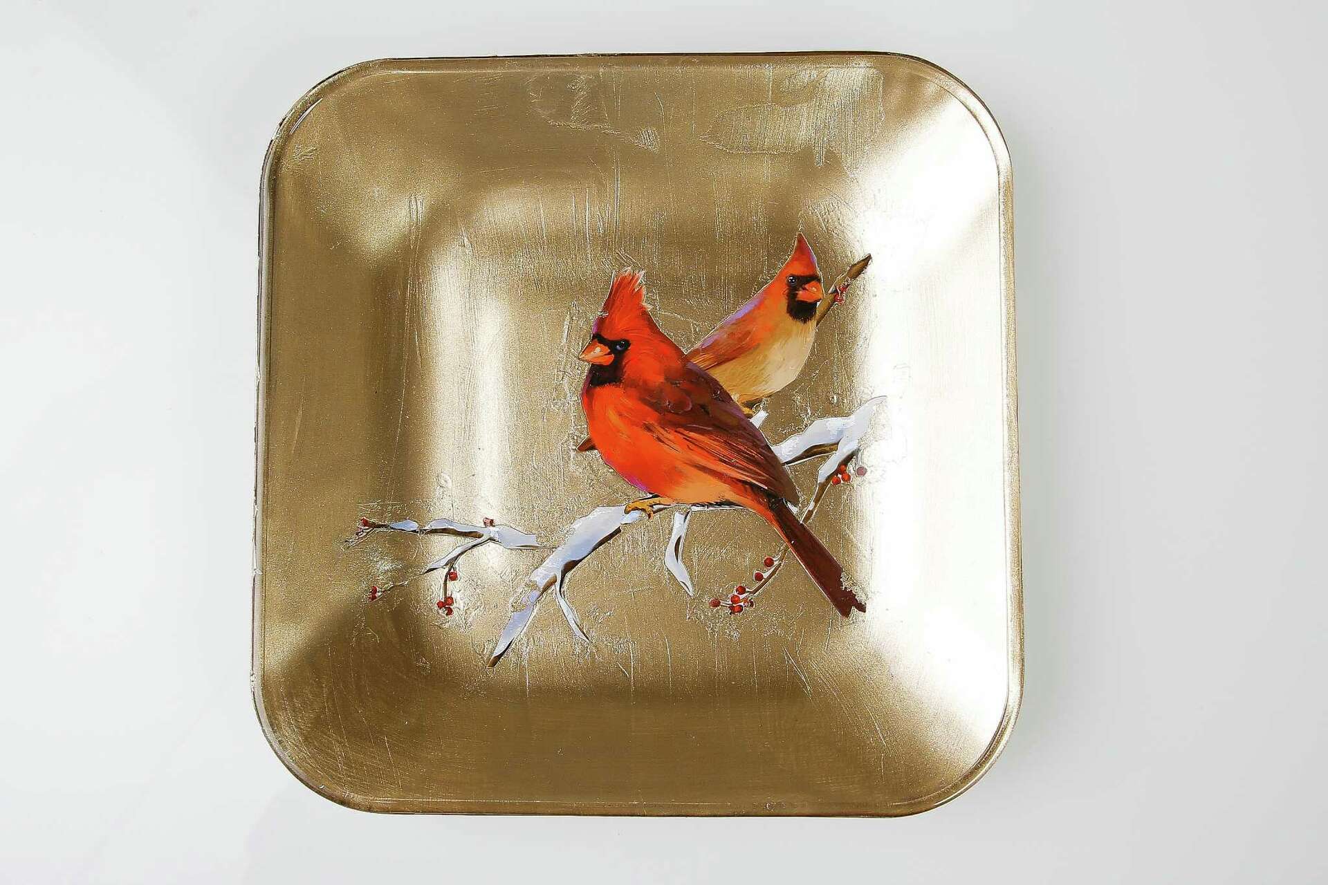 Making decoupage plates is an easy holiday project