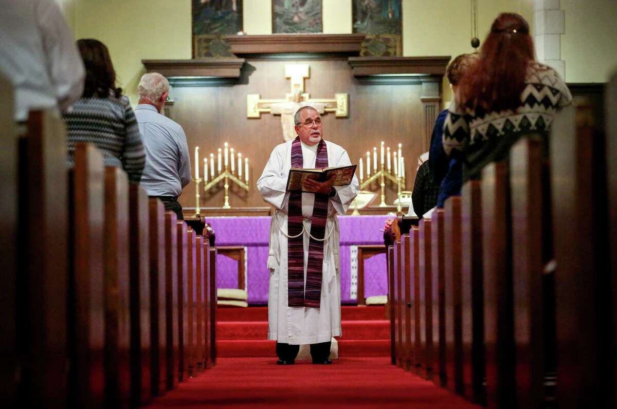 Two hats, two robes: Beaumont judge doubles as Orange Episcopal priest