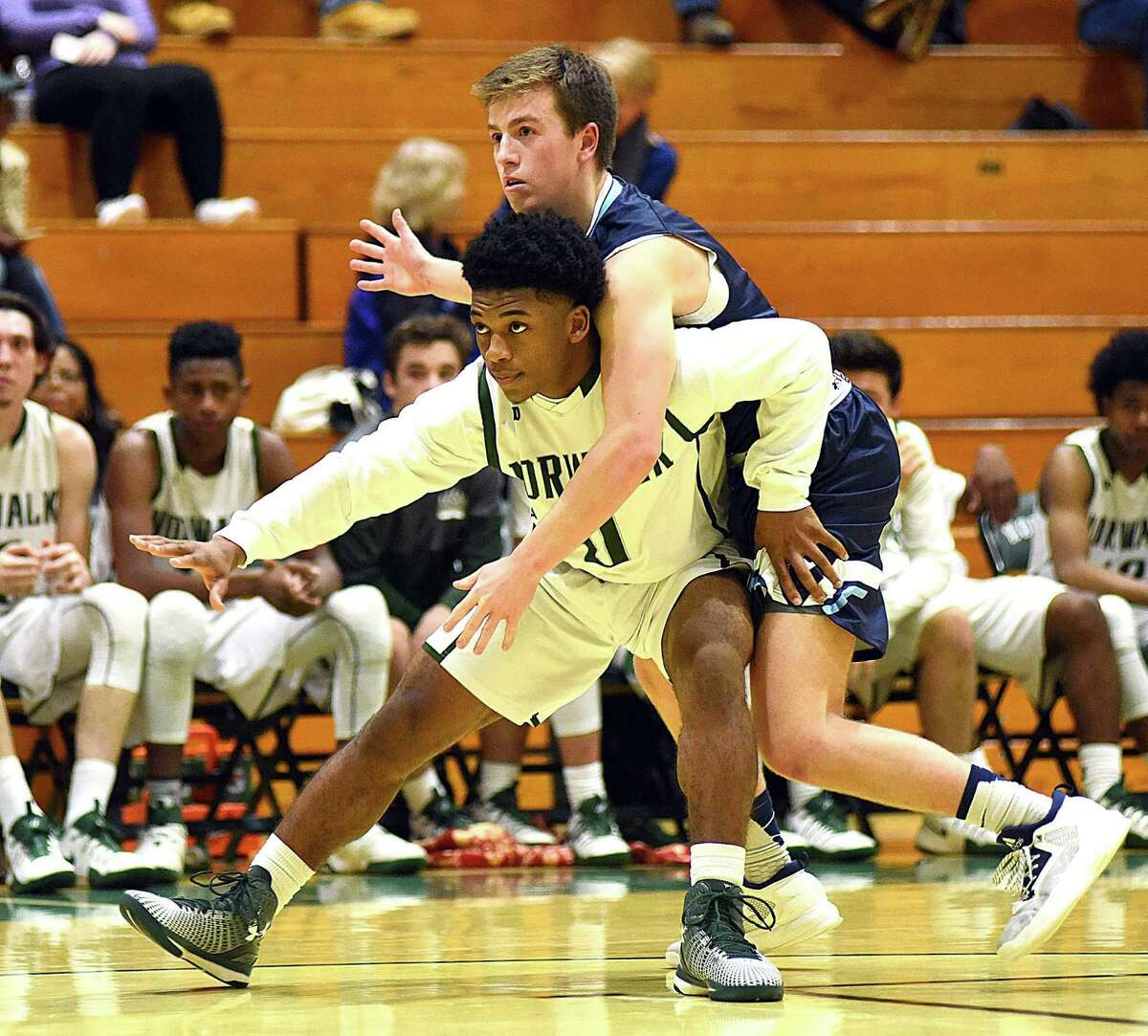 Wilton boys basketball rolls past Norwalk