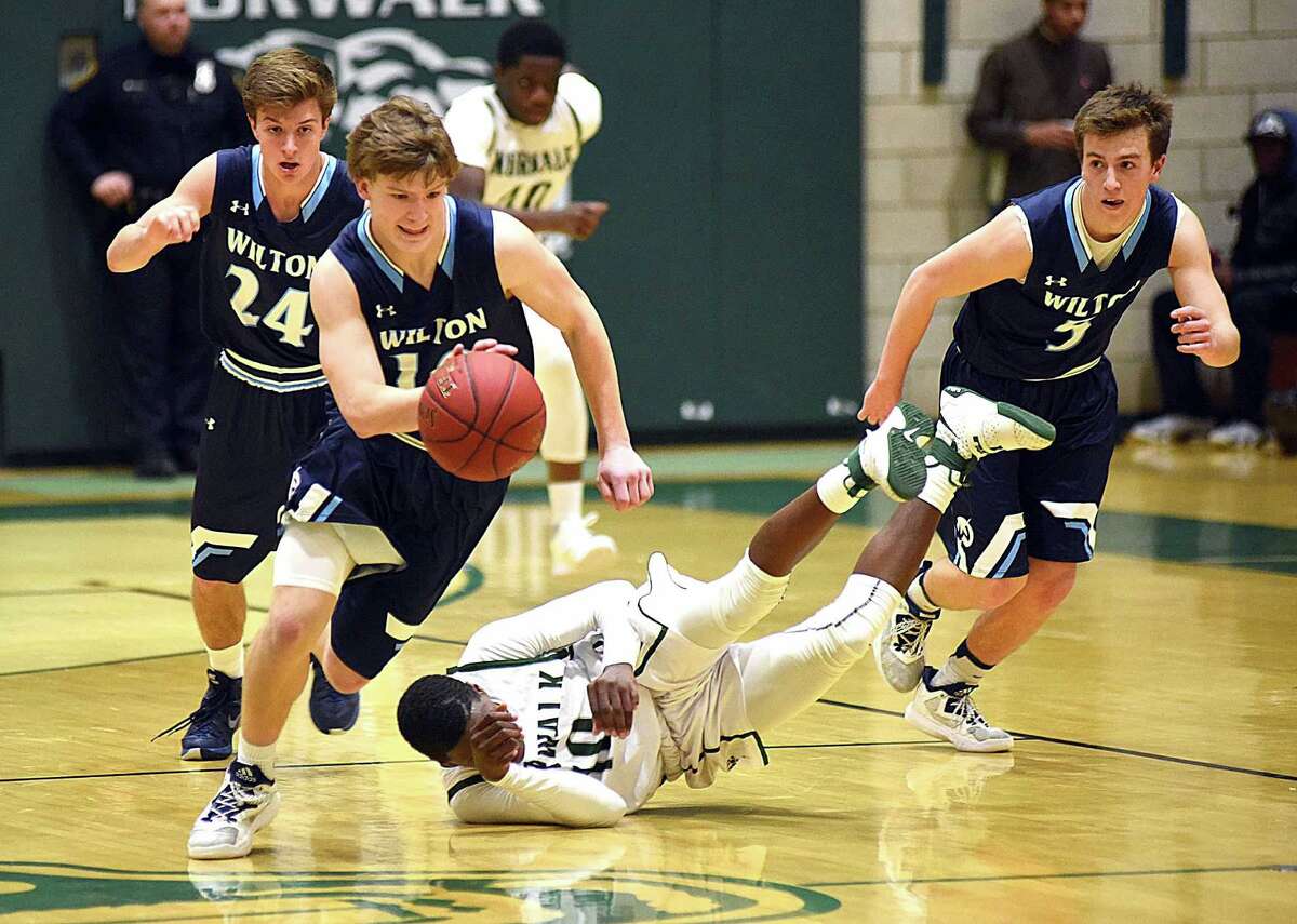 Wilton boys basketball rolls past Norwalk