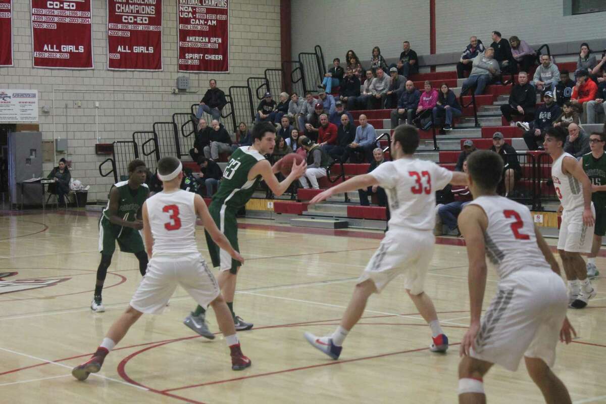 New Milford basketball gets on track against Wolcott