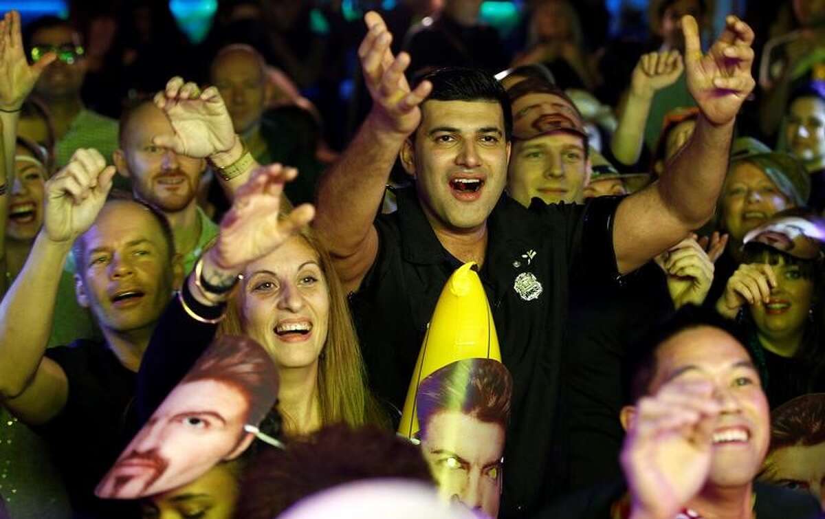 Fans pay tribute to George Michael in London club named after Wham! hit