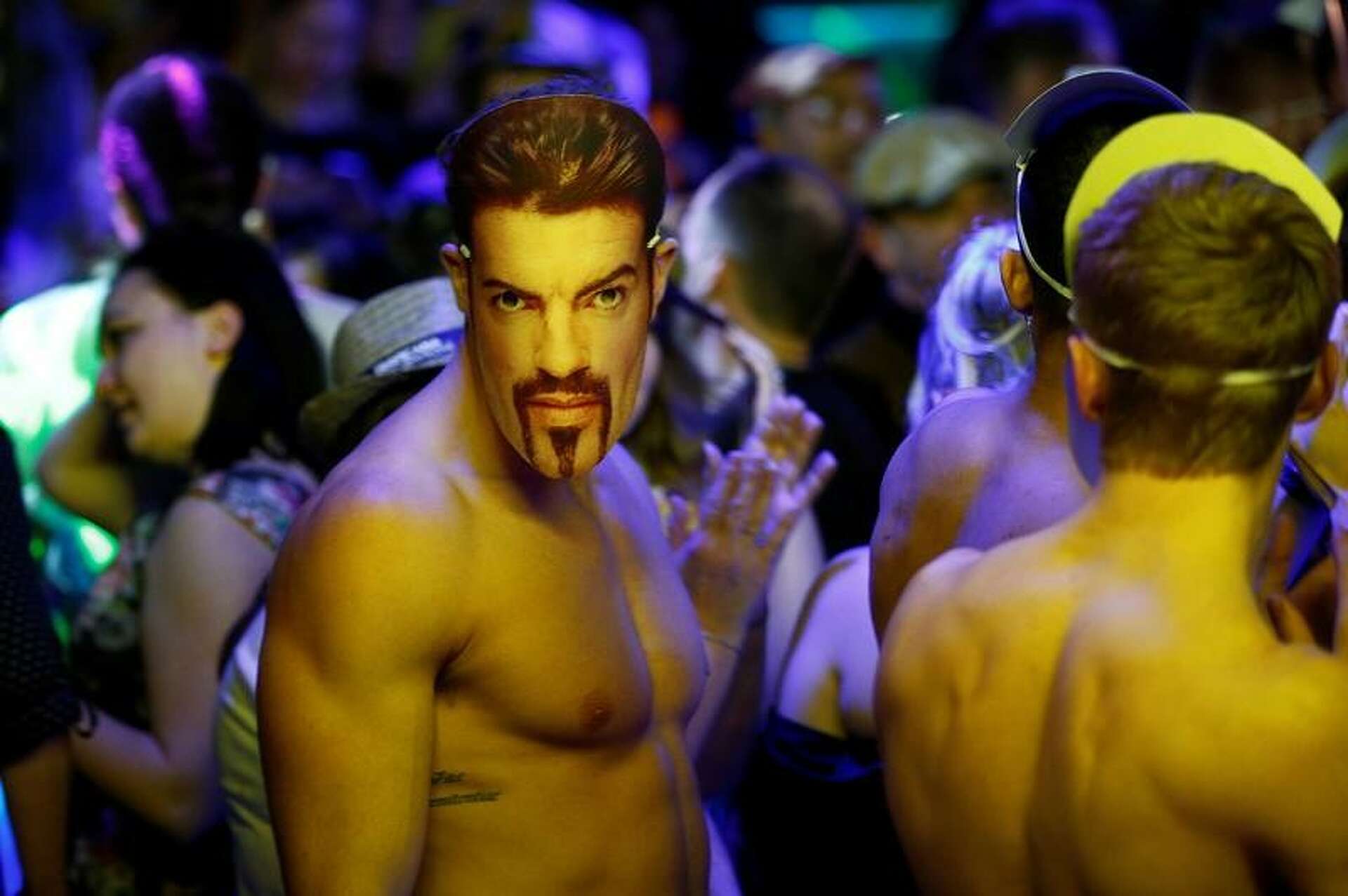 Fans pay tribute to George Michael in London club named after Wham! hit