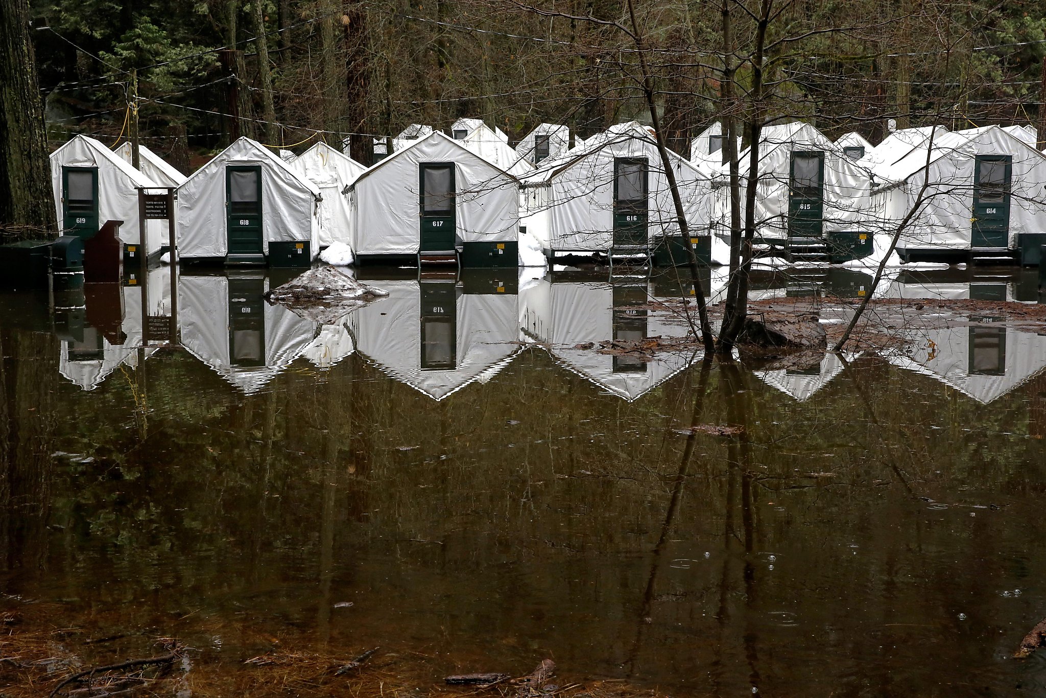 Mop up hampered by landslides and floods, as more rain on the way