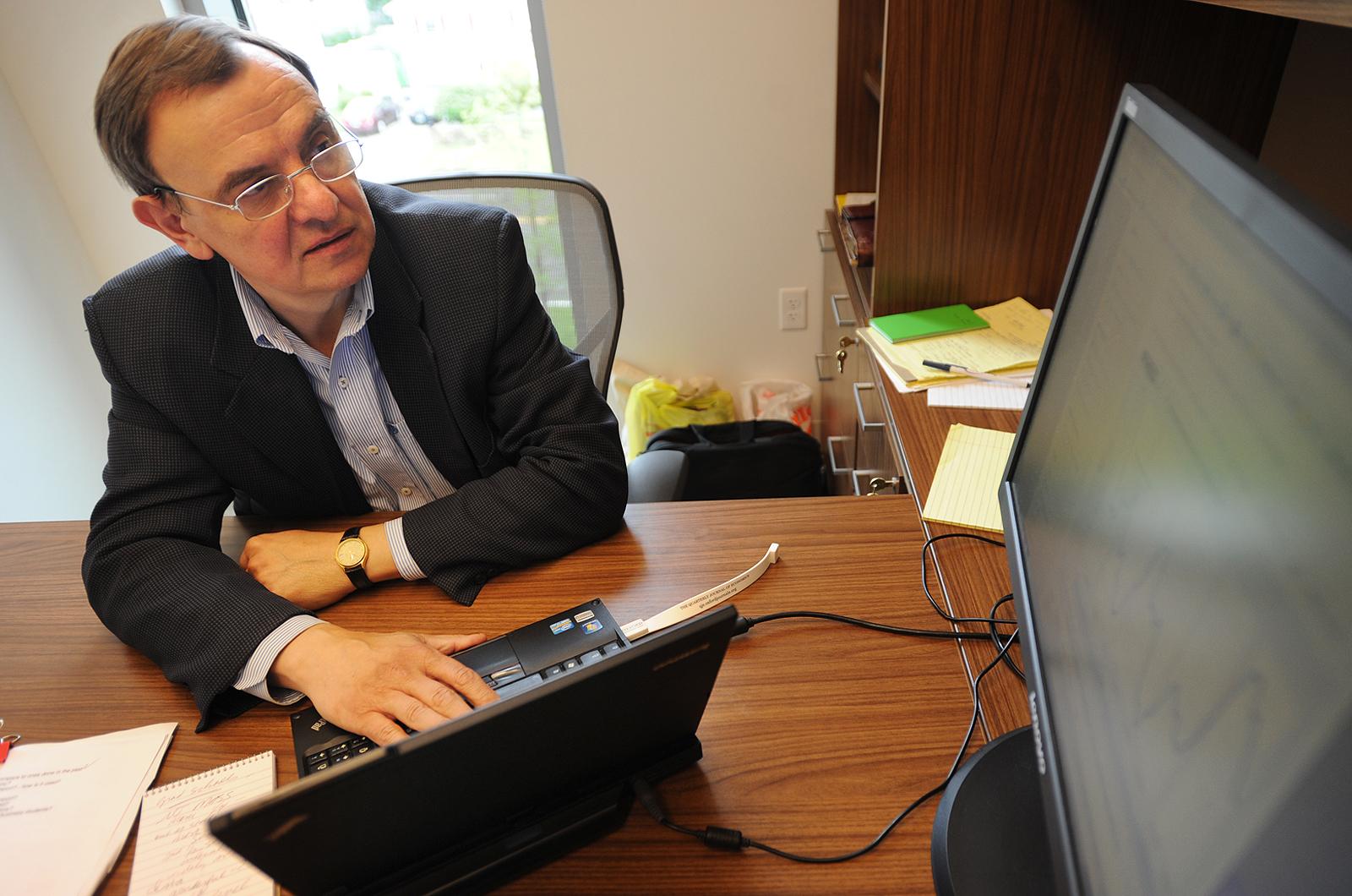 In Norwalk, economists see perils in global economy, potential at home