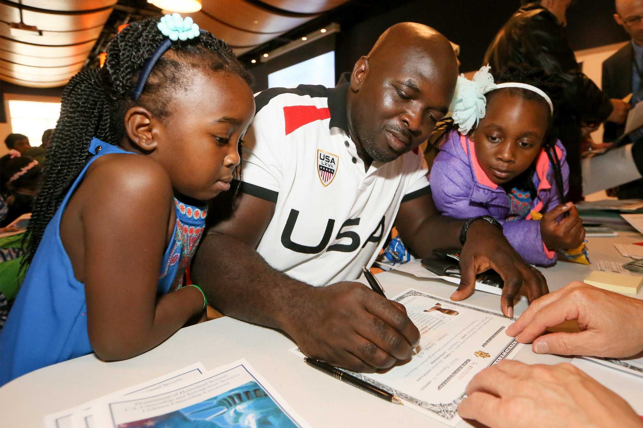 Children from 20 countries take oath to become U.S. citizens