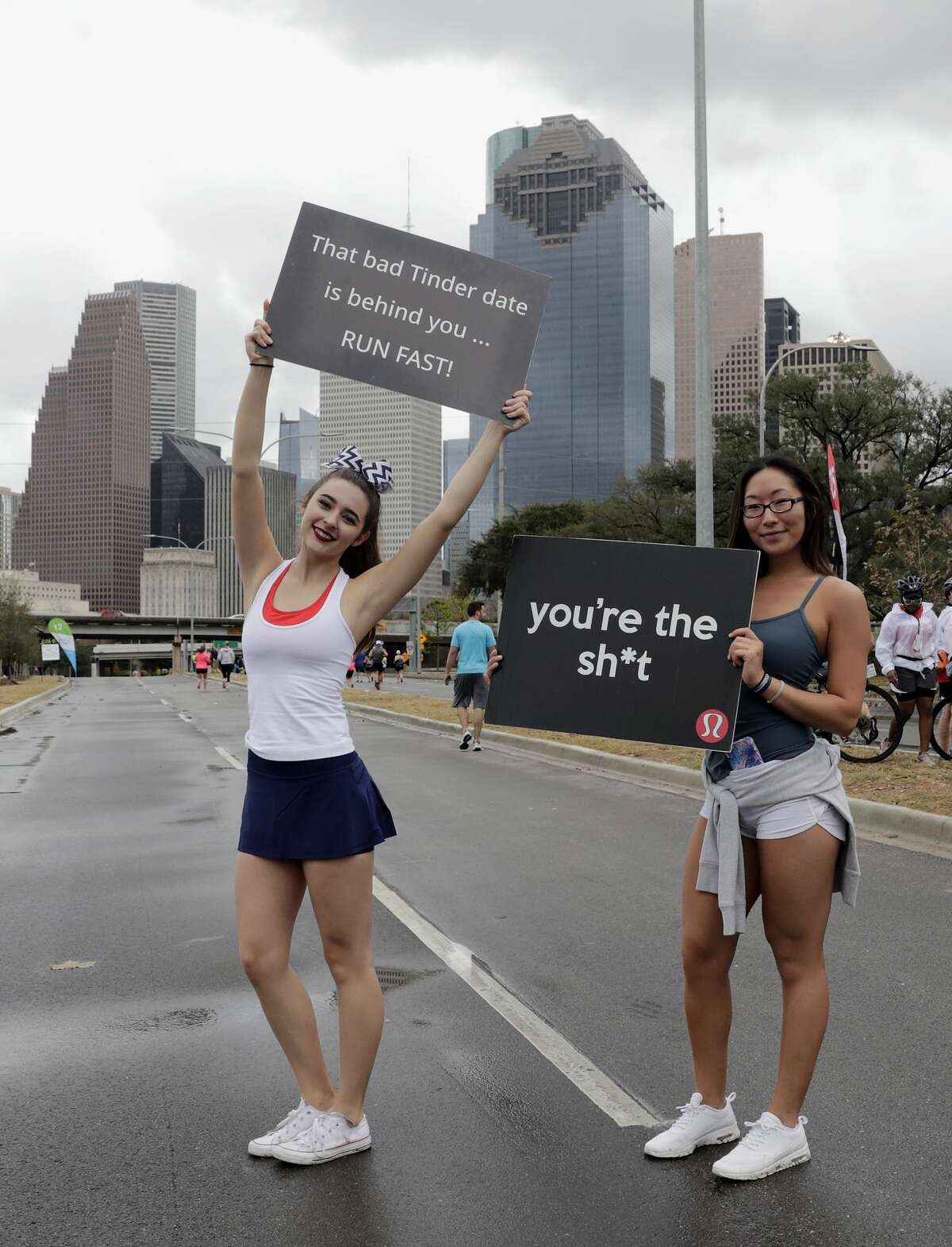 The best signs seen at the Chevron Houston Marathon