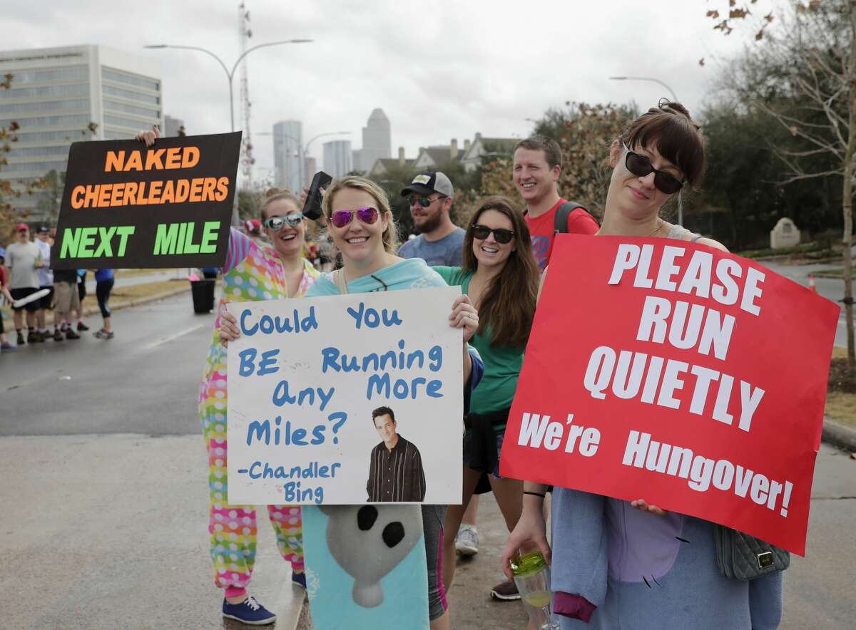 The best signs seen at the Chevron Houston Marathon