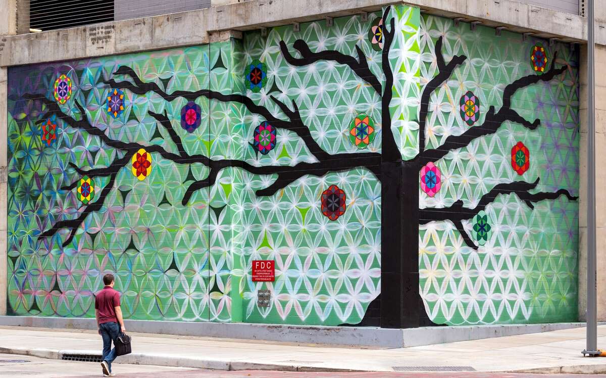 Tree of Life mural unveiled at downtown's Capitol Tower site