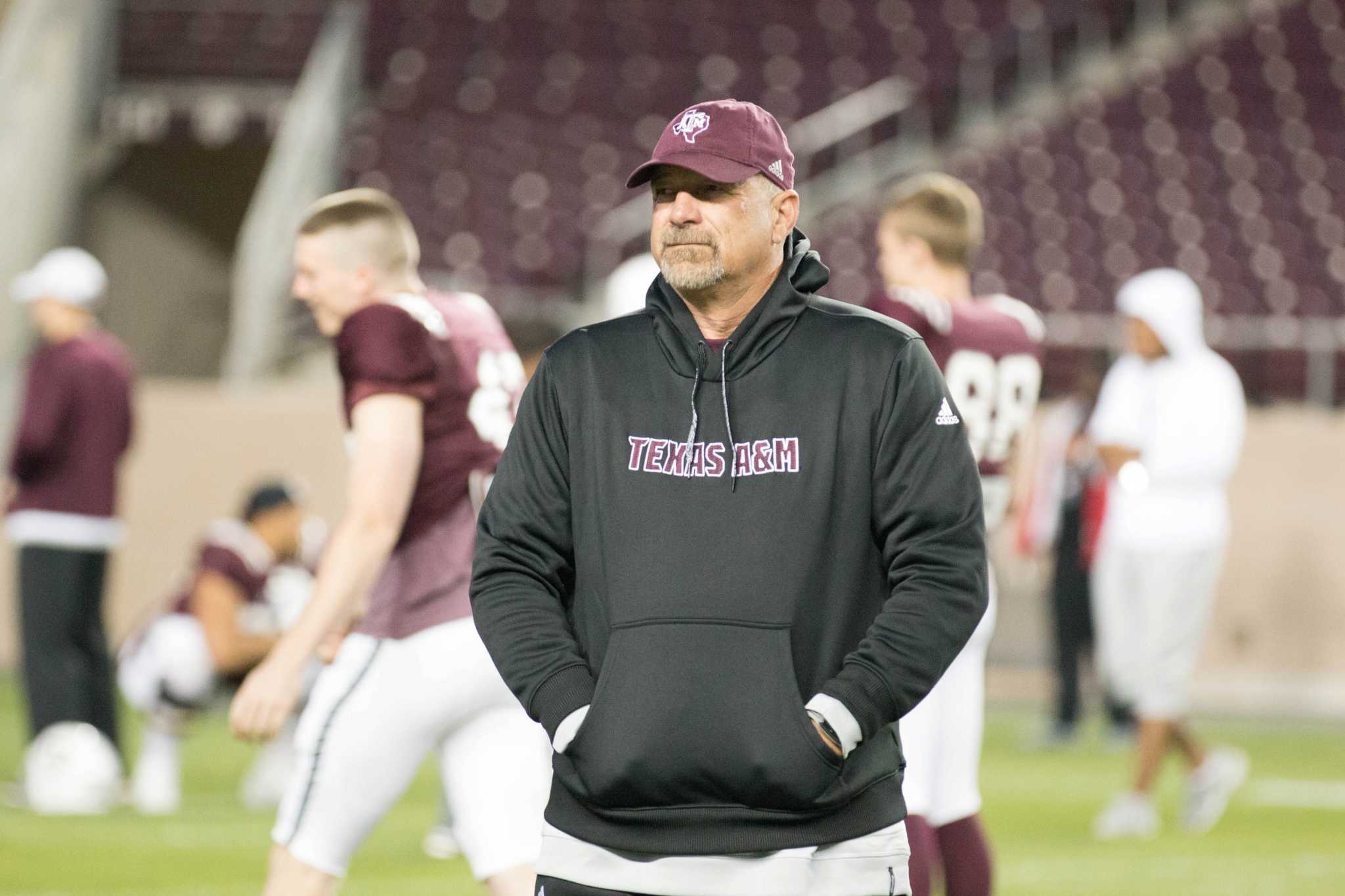 Texas A&M coach Kevin Sumlin checks out coaches, recruits