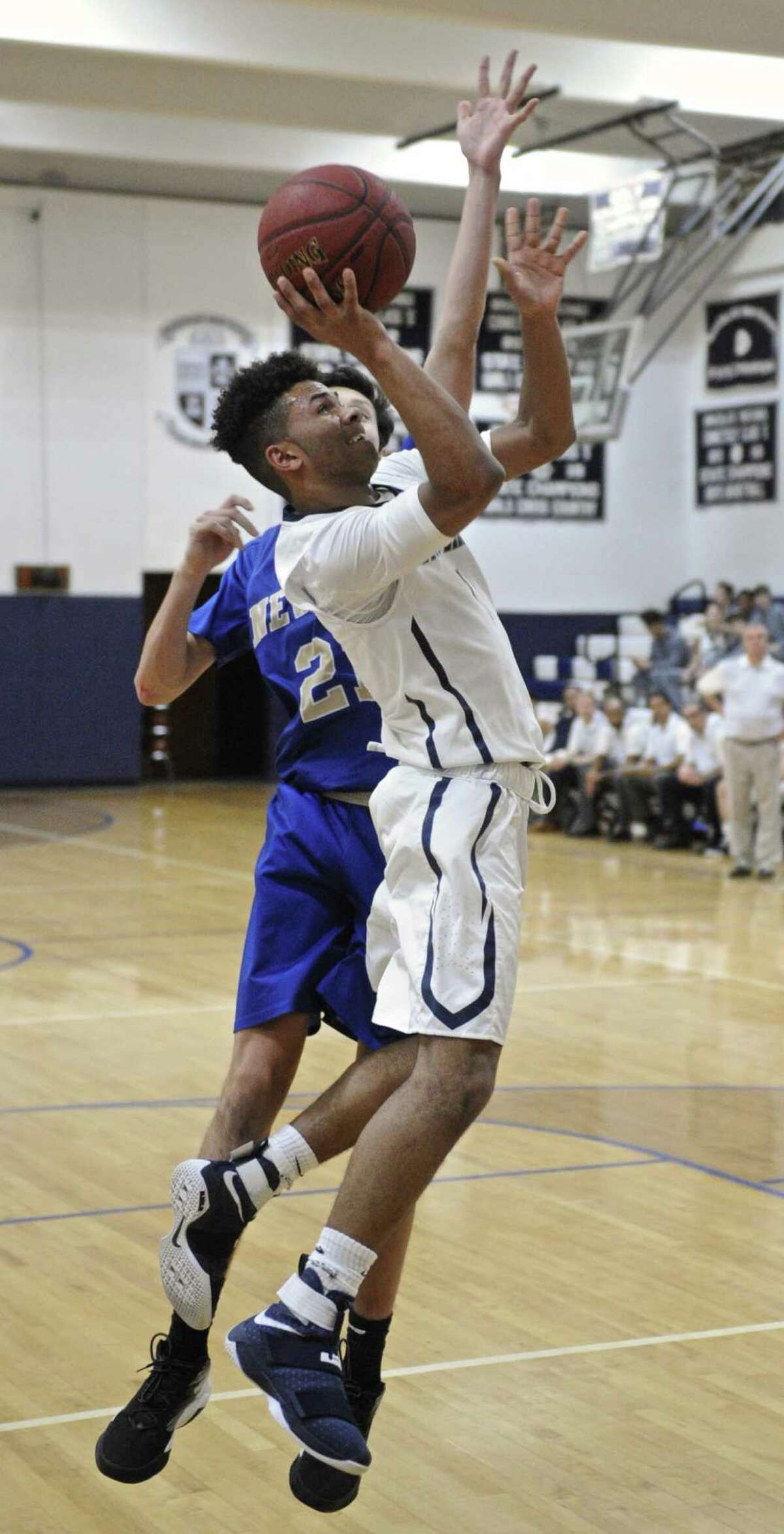 Immaculate boys basketball team rolls past Newtown