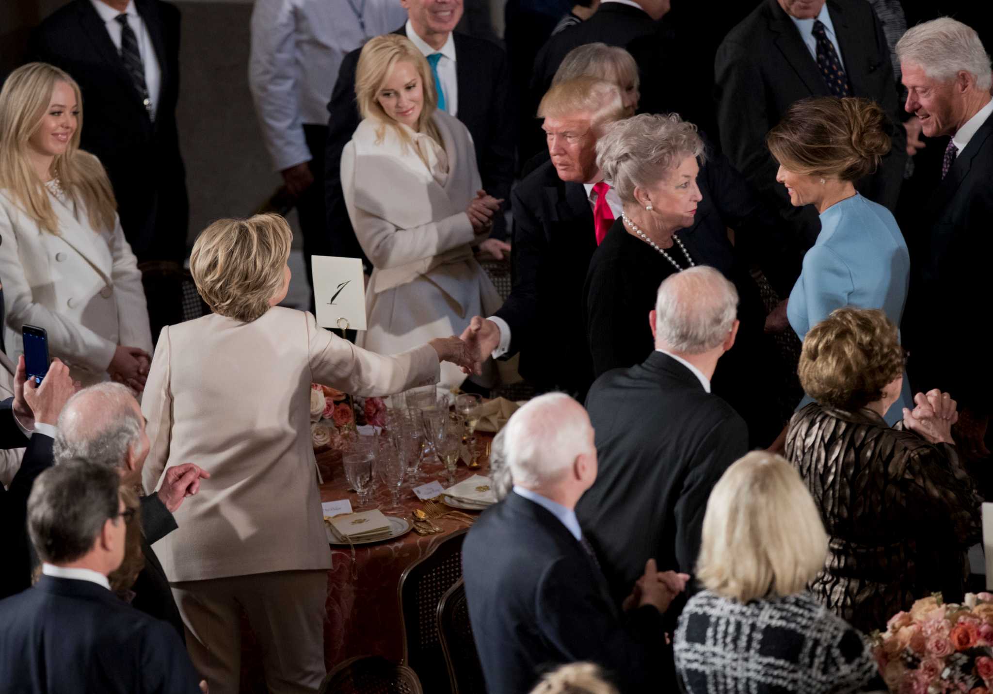 Trump leads standing ovation for Hillary Clinton at inaugural lunch