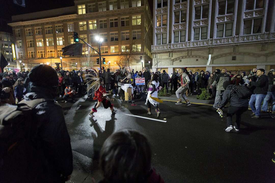Protesters at Golden Gate Bridge link arms to send Trump message
