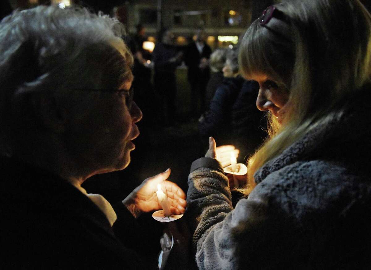 Among fears, calls for action at vigil