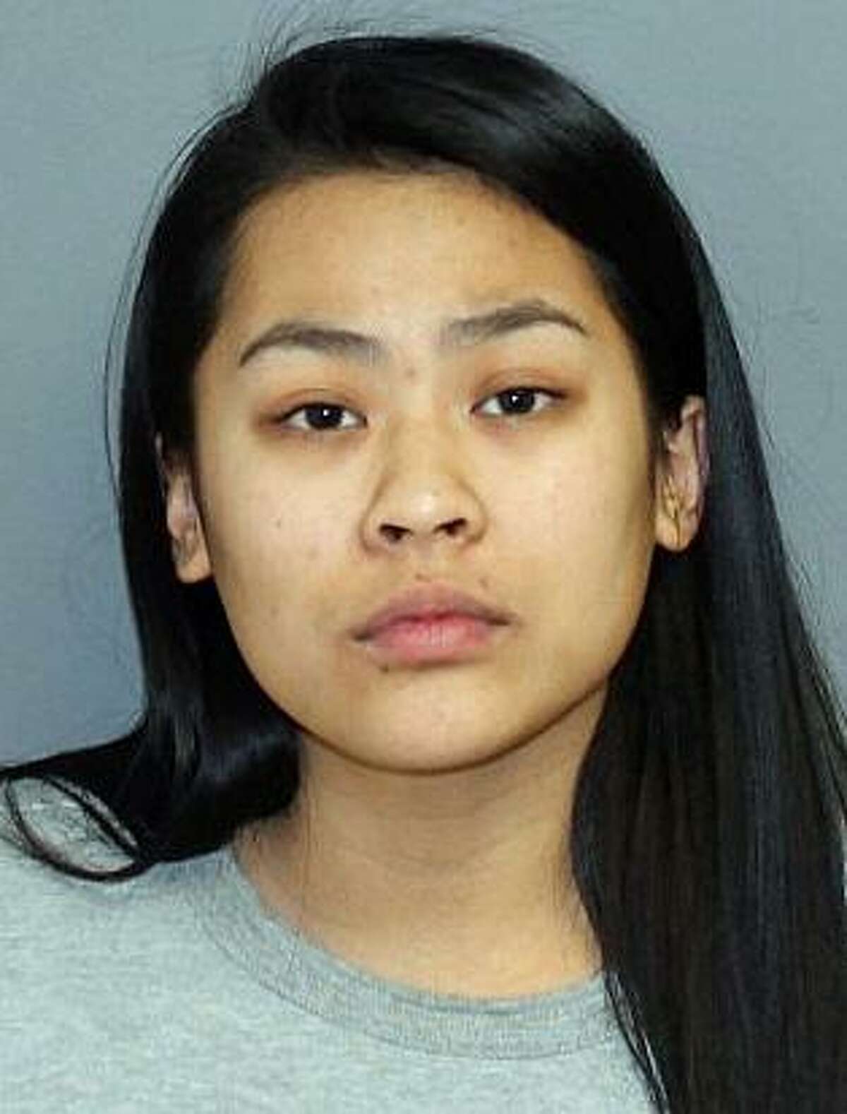 Shelton police: Woman stole firearm from vehicle
