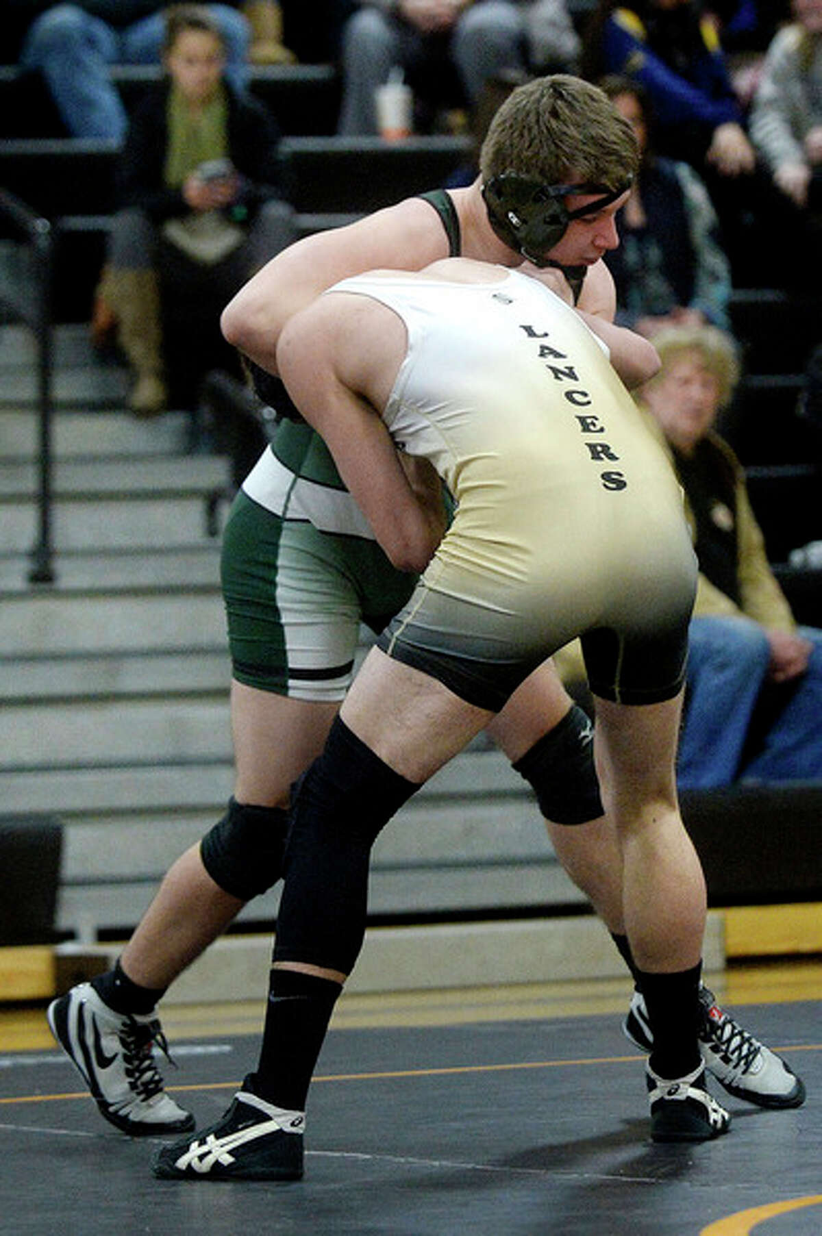 Falcon wrestlers beat Lancers, Vikings