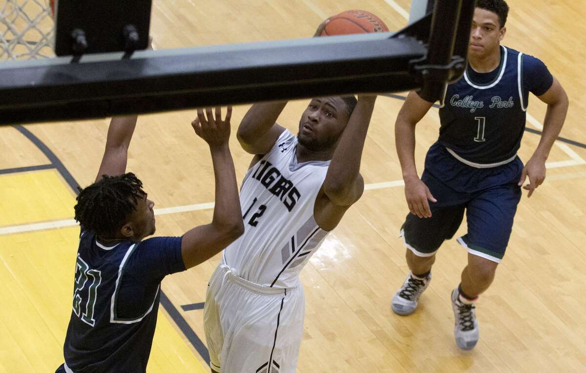 BOYS HOOPS: Lewis, Tigers blow past College Park