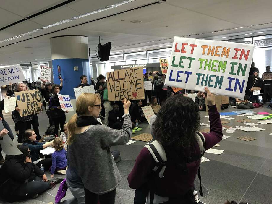 More than 1,000 protesters rally at SFO against immigration ban - SFGate