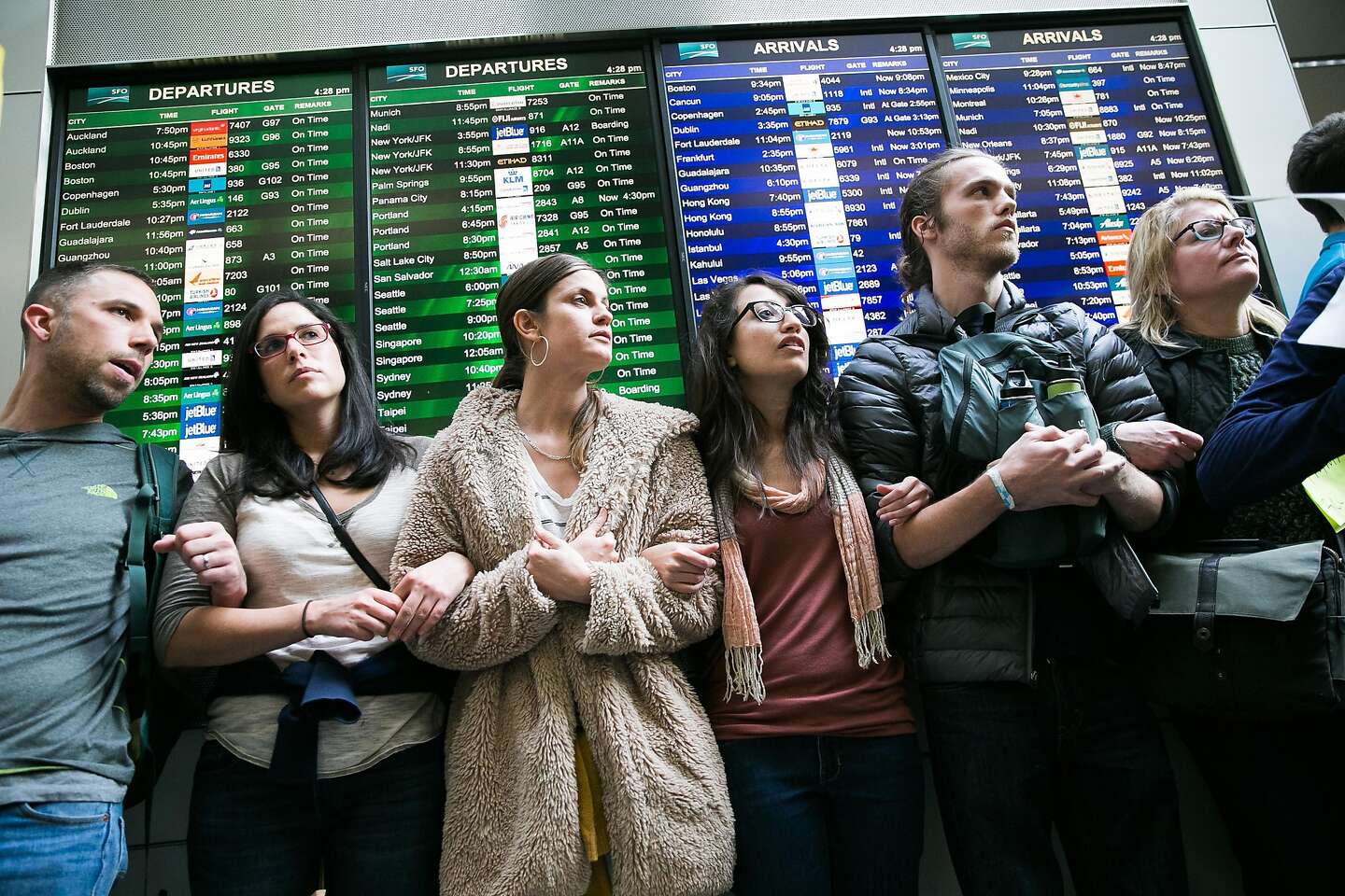 More than 1,000 protesters rally at SFO against immigration ban