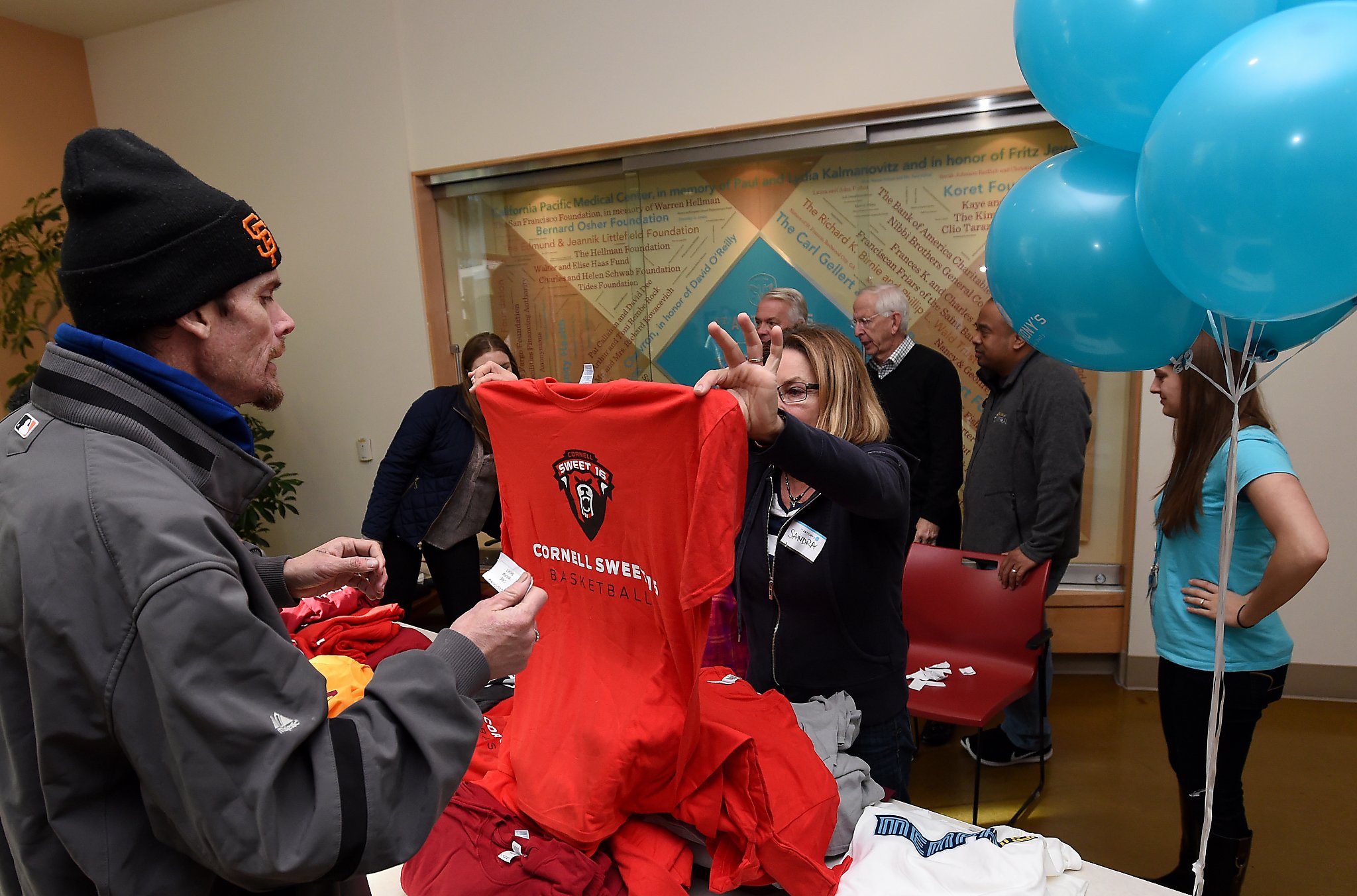 SF homeless happy to accept free Cleveland Cavaliers T-shirts