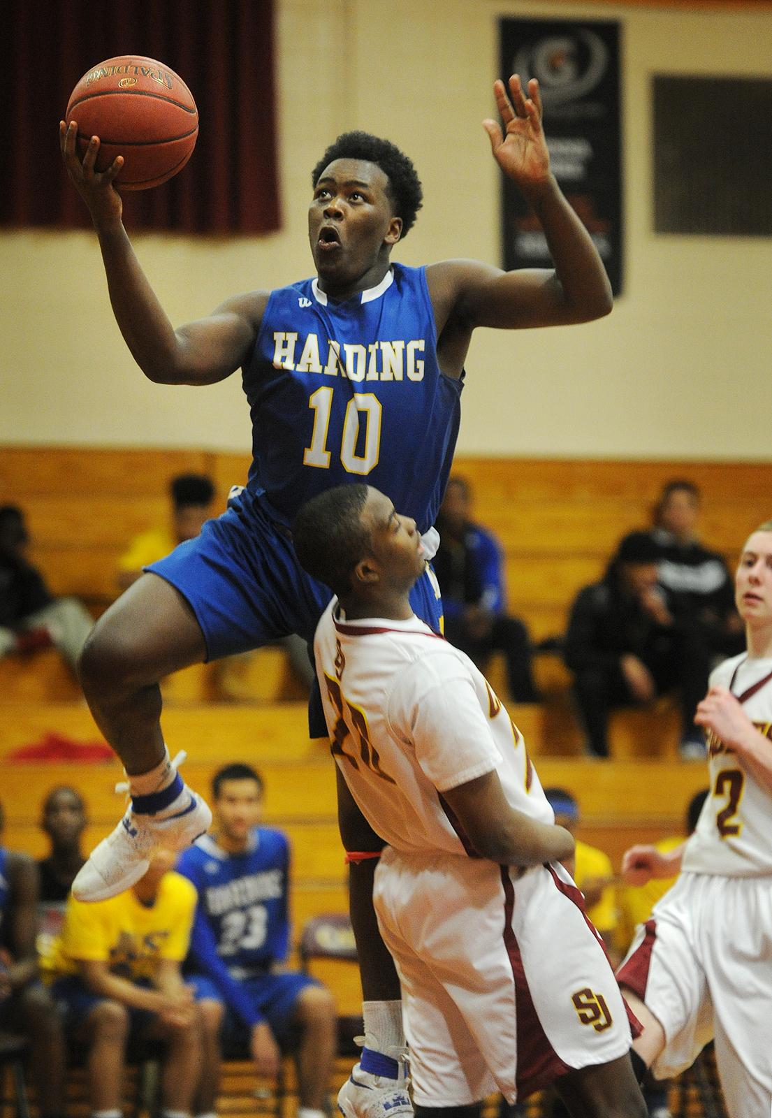 Harding boys hold off St. Joseph